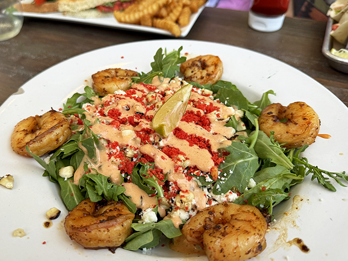 Fresh salad preparations prove that healthy options receive the same creative attention and quality ingredients as the indulgent breakfast favorites.
