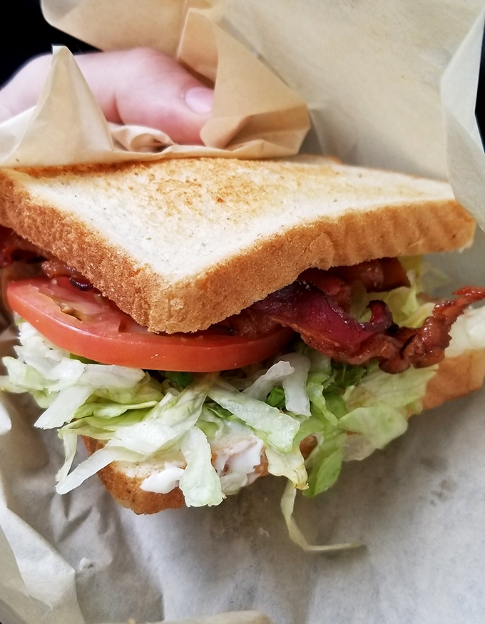 This isn't just a BLT – it's architectural perfection between two slices of toast, where every ingredient knows its role and plays it beautifully.