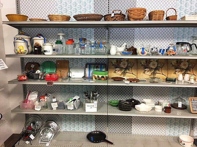 Kitchen treasures organized with the precision of a museum curator&mdash;vintage Pyrex and Mason jars just waiting to elevate your pantry selfie game.