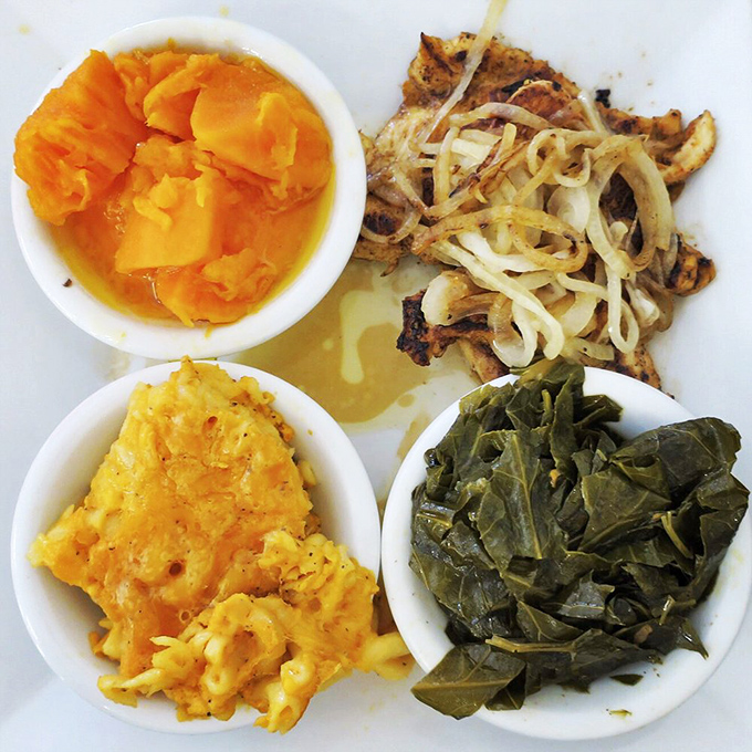 Soul food's greatest hits on one plate: collards singing with pot likker, mac and cheese that's all attitude, and candied yams sweet as a lullaby.