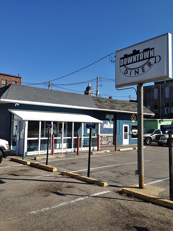 The sign beckons like a lighthouse for the hungry, promising refuge from chain restaurants and sad drive-thru breakfasts.