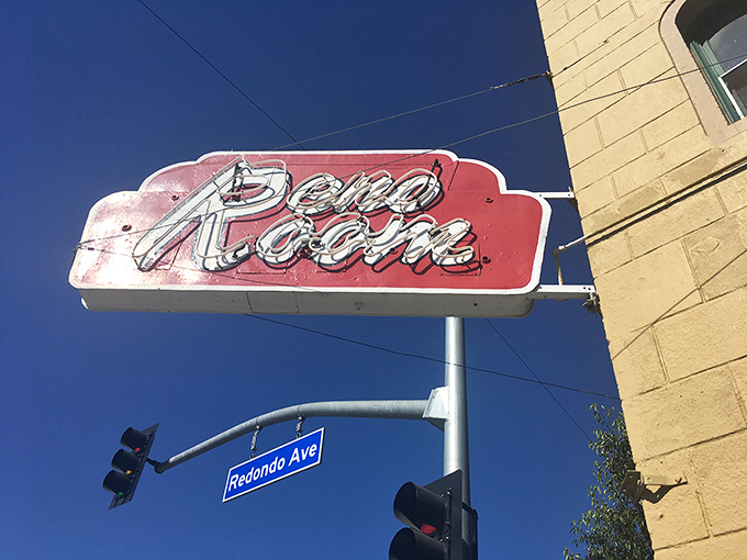 That vintage sign against the blue California sky has been guiding thirsty souls to salvation for generations.