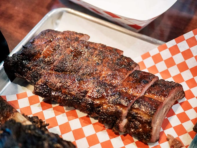 A rack of ribs with such perfect caramelization it borders on sorcery. The kind of bark that makes you want to tap it just to hear the sound.