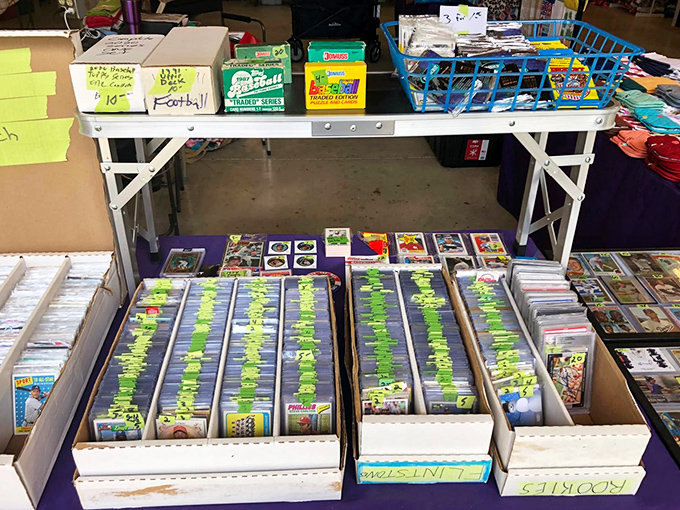 Card collectors' paradise! Organized chaos of sports memorabilia where that rookie card you've hunted for decades might be hiding in plain sight.