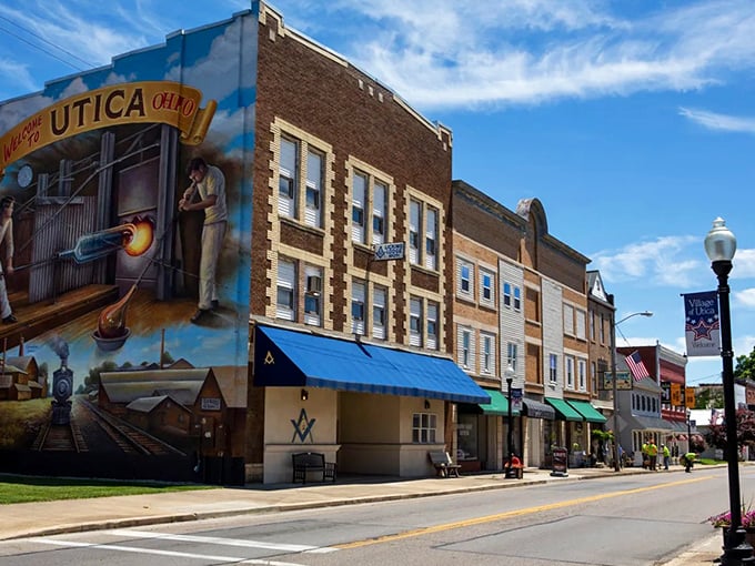 Perspective matters. From this angle, Utica's impressive mural dominates the streetscape, reminding visitors of the town's rich industrial heritage.