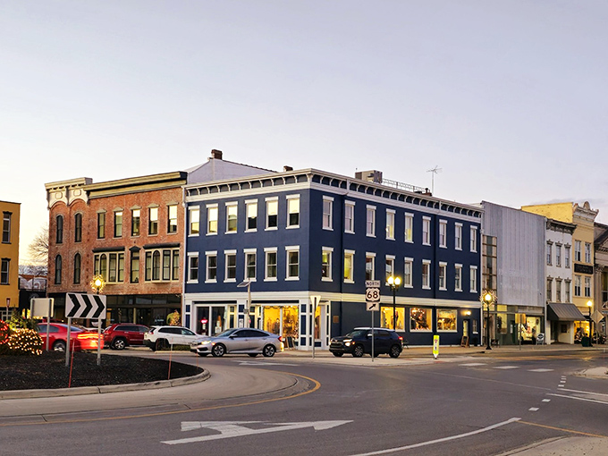 As dusk settles on downtown Urbana, the historic buildings glow with warm light, creating an architectural chorus line of past and present.