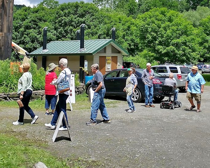 The secret's slowly getting out! Park visitors gather for a guided tour, each face showing that unique mix of relaxation and wonder that Salt Springs inspires.