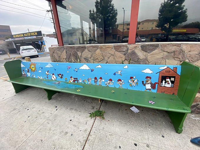 Even the waiting bench tells a chicken story. When art depicts poultry's journey from coop to plate, you know you're at a place that takes its birds seriously.
