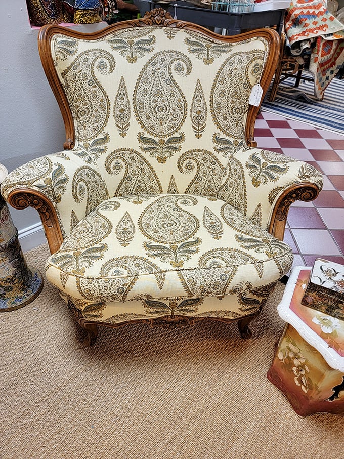 This paisley-upholstered berg&egrave;re chair isn't asking for your approval&mdash;it's waiting for you to realize you've been looking for it all along.