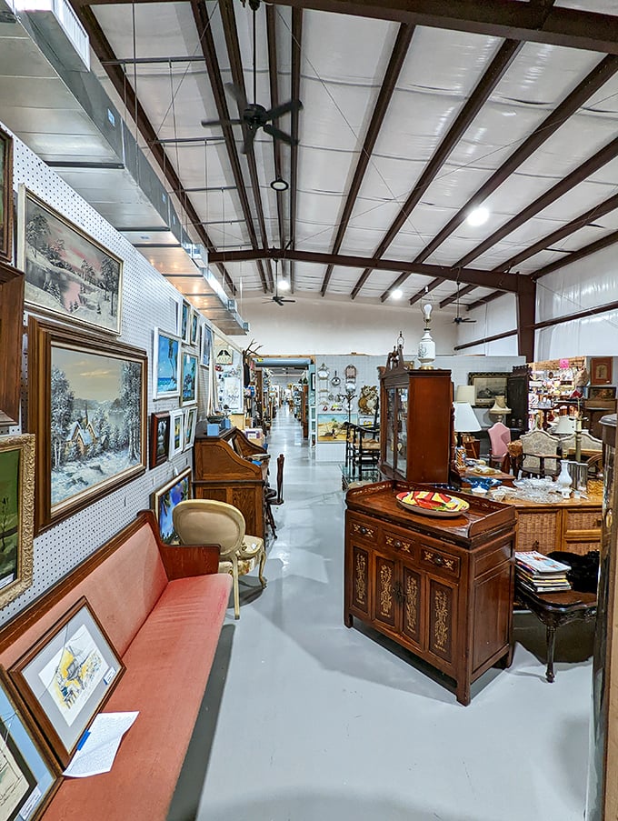 Elegant wooden furniture with the patina of age creates vignettes of bygone eras. That coral sofa has hosted conversations we can only imagine.