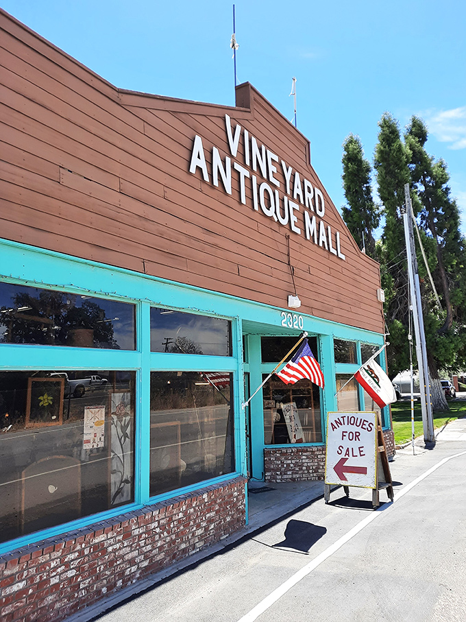 Vineyard Antique Mall's rustic exterior with bright turquoise accents &ndash; like a barn that swallowed a century of treasures.