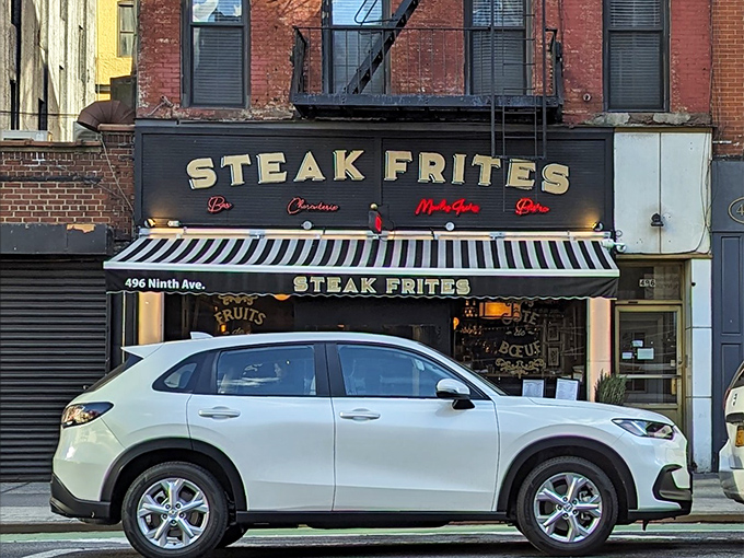 The striped awning and golden lettering promise French bistro magic. Steak Frites keeps it simple and simply perfect.