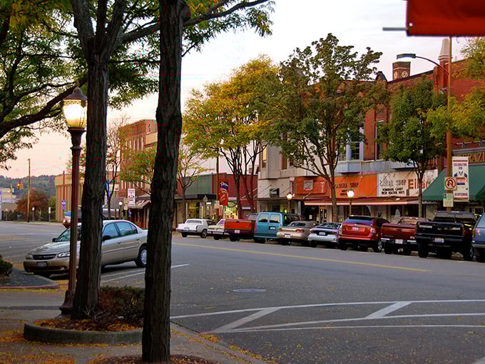 Third Street captures that magical small-town moment when sunset bathes historic buildings in golden light and everyday life becomes extraordinary.