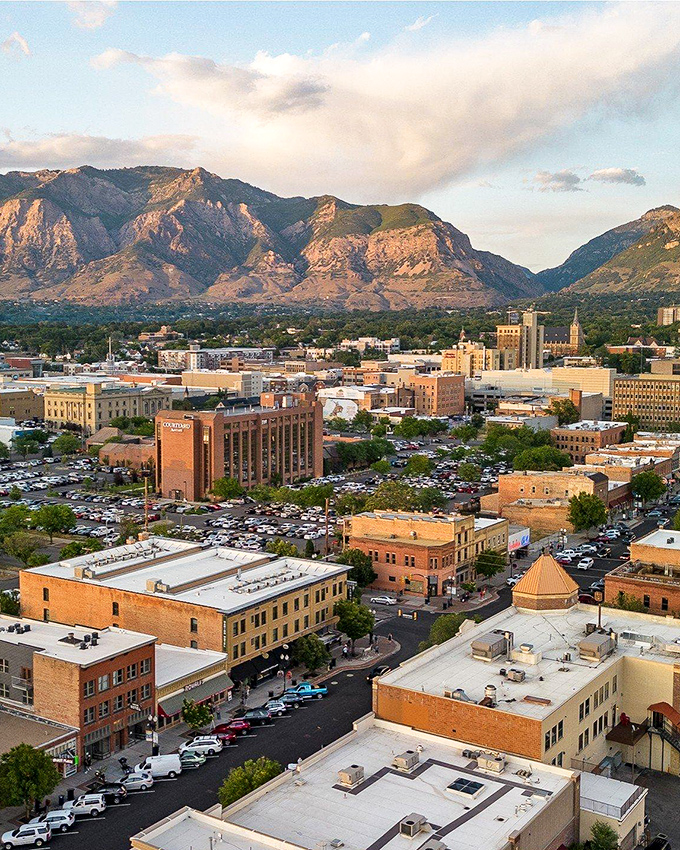 From above, Ogden reveals its perfect positioning&mdash;urban amenities nestled against wilderness, with mountains standing guard like ancient sentinels.