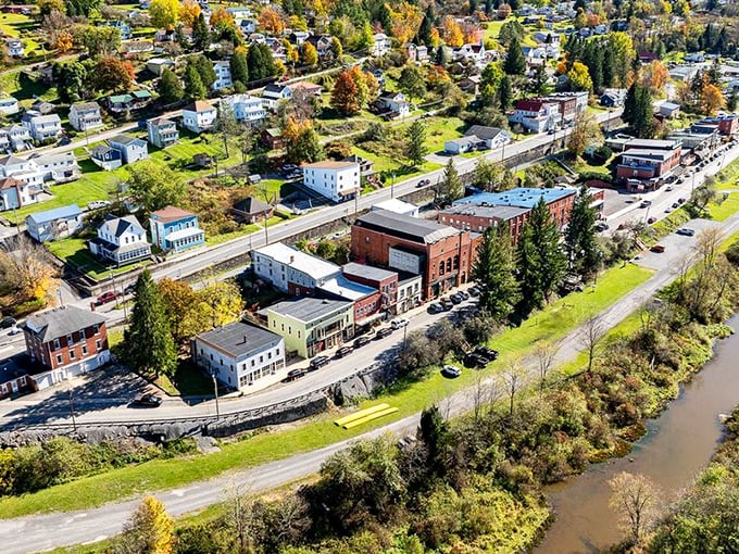 From above, Thomas reveals its perfect positioning &ndash; nestled between rolling hills and the river that once powered its industrial ambitions.
