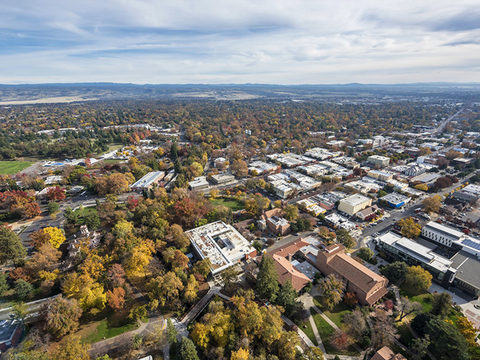 Chico's autumn canopy creates a patchwork quilt of color in this aerial view, revealing the harmonious blend of campus, downtown and residential areas.