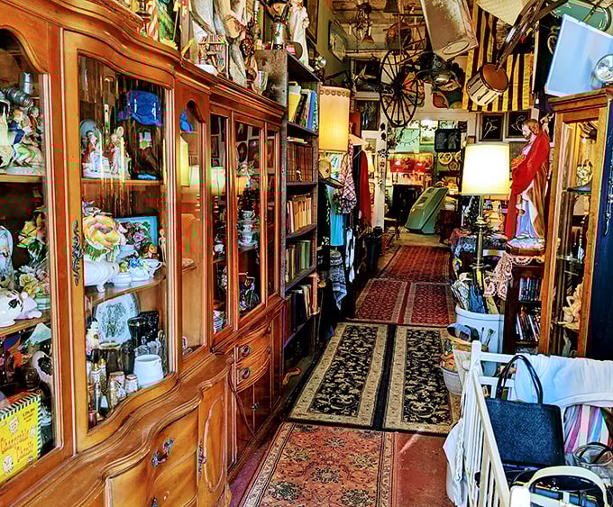 The antique corridor feels like wandering through the world's most interesting grandmother's house, where everything has a story and a price tag. 