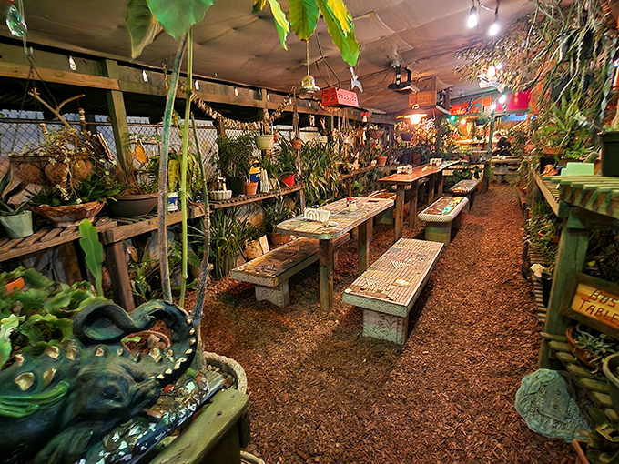 Garden dining that feels like you've stumbled into a secret tropical hideaway. Those plants aren't decorations&mdash;they're your dinner companions.