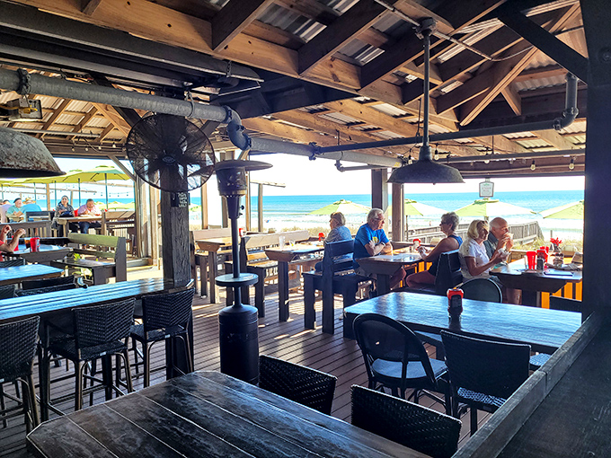 Al fresco dining with that million-dollar view&mdash;where every table feels like the best seat in the house and the Gulf becomes your dining companion.