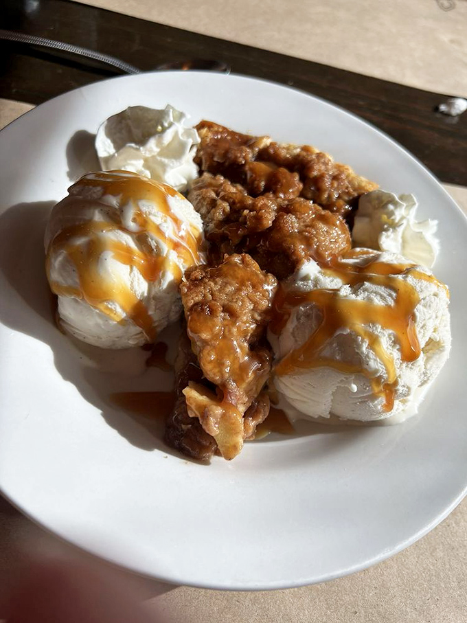 Apple pie that makes a compelling case for dessert stomachs being real. That caramel drizzle and ice cream are not negotiable additions.