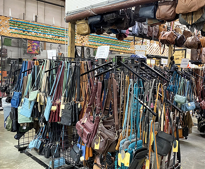 Handbag heaven, where leather dreams hang in technicolor abundance. The perfect place to find that purse that holds everything&mdash;including your flea market treasures.