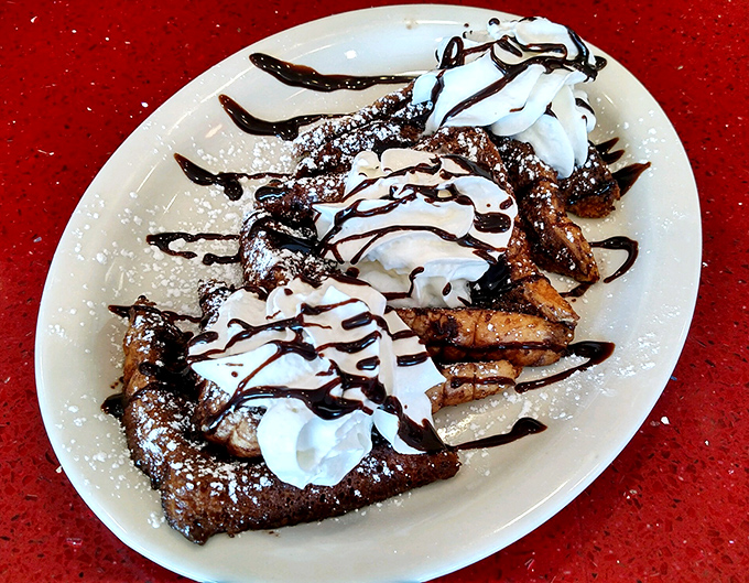 Banana Split French Toast: where breakfast and dessert stop fighting and finally make peace. Your inner child just high-fived your adult self.