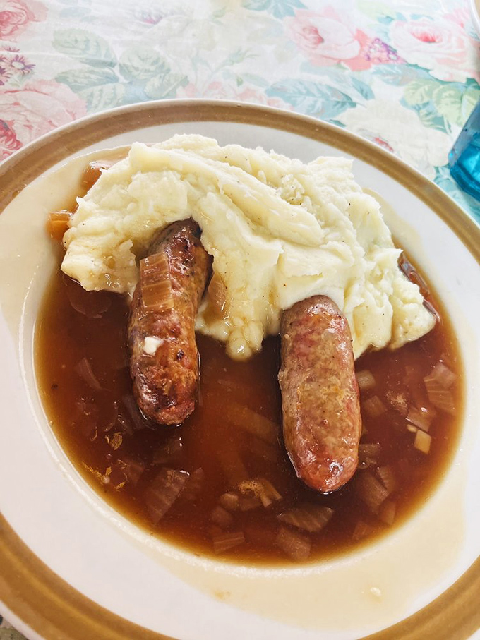 Comfort food that crosses the Atlantic with style. These bangers nestled in rich gravy with a cloud of mashed potatoes prove British cuisine is more than just fish and chips.