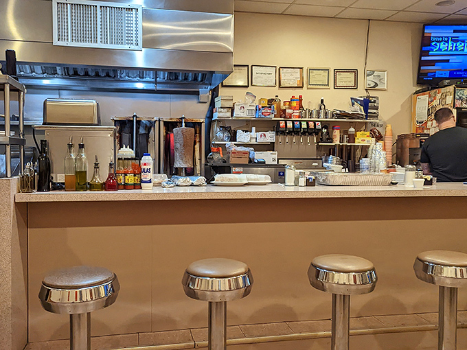 The beating heart of any great diner: the counter where magic happens. Those stools have witnessed countless coffee refills and life-changing breakfast decisions.