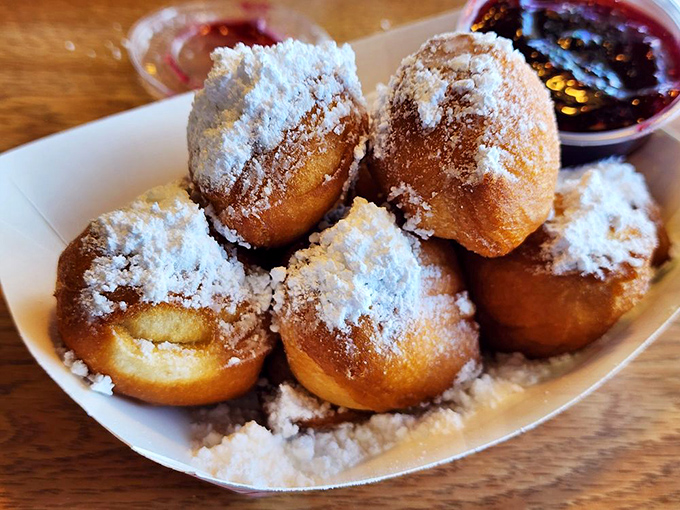 These beignets look like they've been caught in a powdered sugar snowstorm, and I've never been happier about inclement weather.