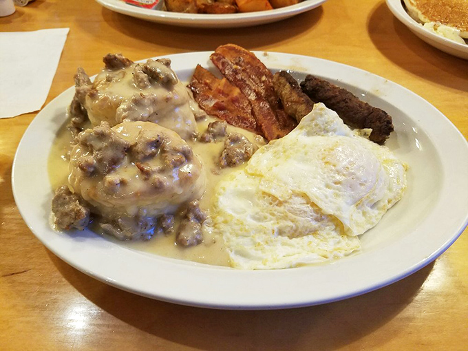 Biscuits and gravy with sunny-side up eggs isn't breakfast &ndash; it's an edible monument to mornings done right and a shield against whatever the day holds.