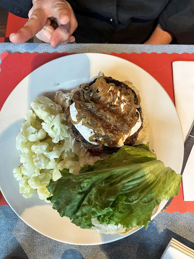 A burger topped with bleu cheese and grilled onions isn't just food&mdash;it's a flavor explosion that makes your taste buds stand up and applaud.