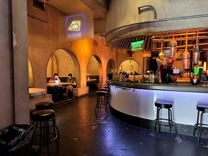 Cozy booths tucked into arched alcoves offer the perfect spot for plotting your next adventure or just enjoying your Falcon Burger in relative privacy.