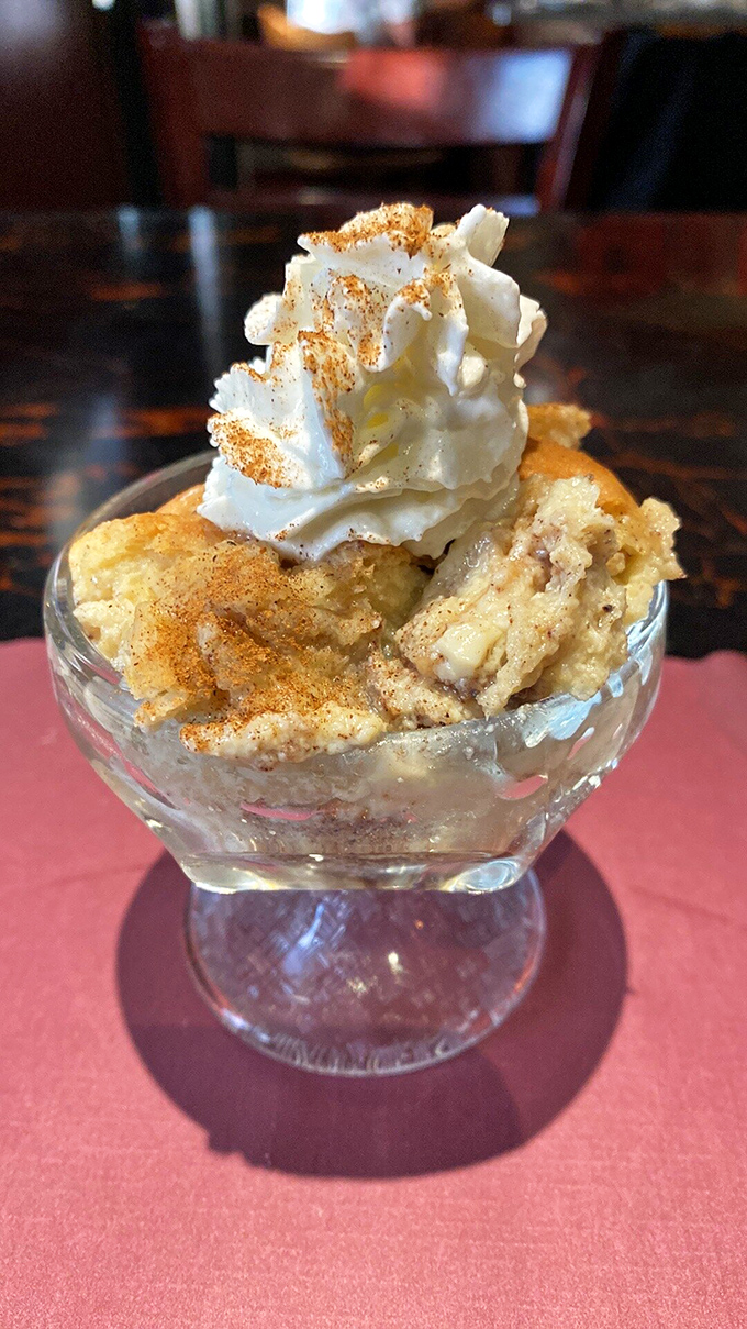 Bread pudding that makes you question why anyone bothers with fancy desserts when this cinnamon-spiced cloud of comfort exists in the world.