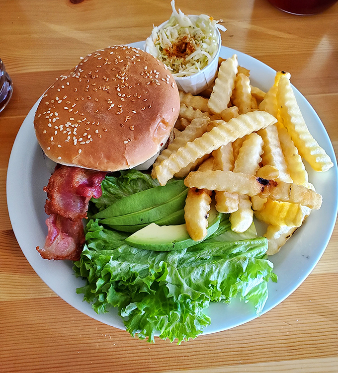 A burger that understands the importance of proper lettuce-to-patty ratio, with fries that deserve their own fan club.