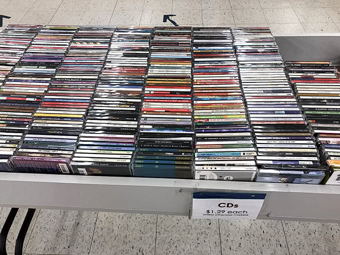 CD wonderland for music lovers who remember when albums were physical objects. Each case holds sonic memories waiting to be rediscovered.