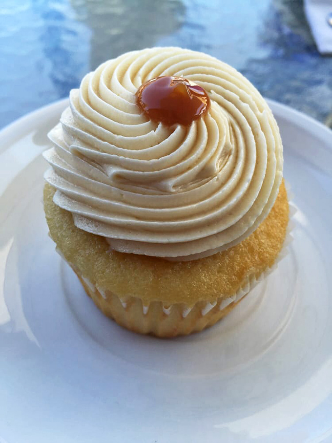 This caramel-topped cupcake isn't just dessert, it's an edible work of art with a swirl of frosting that would make any pastry chef proud.