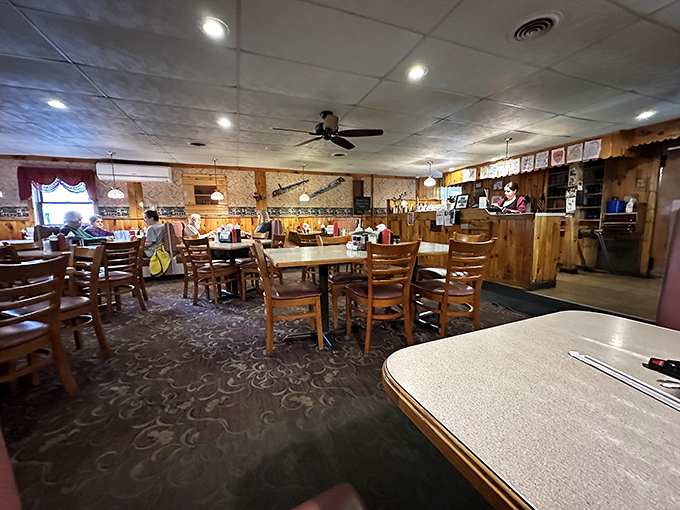 Morning light streams through windows onto wooden tables where countless conversations have unfolded over steaming coffee cups and hearty meals.