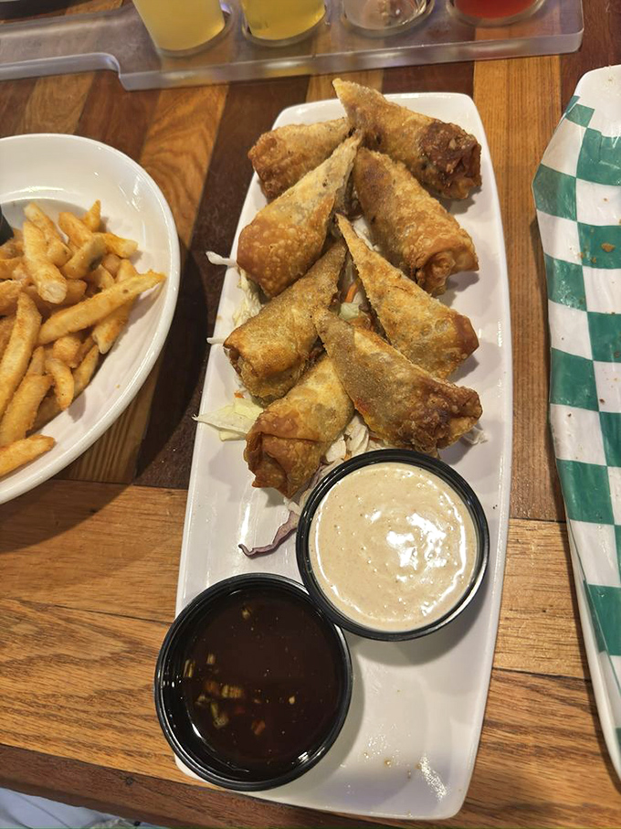 These aren't your average egg rolls &ndash; they're cheesesteak reinvented, crispy on the outside, gooey and savory within, served with dipping sauces for extra flavor adventure.