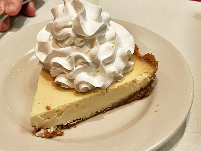 This cheesecake slice could double as a doorstop, but you'll demolish it anyway because resistance is futile.