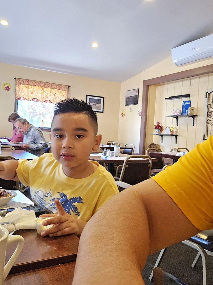 The diner's multi-generational appeal captured in one image &ndash; where breakfast traditions are passed down like family heirlooms.