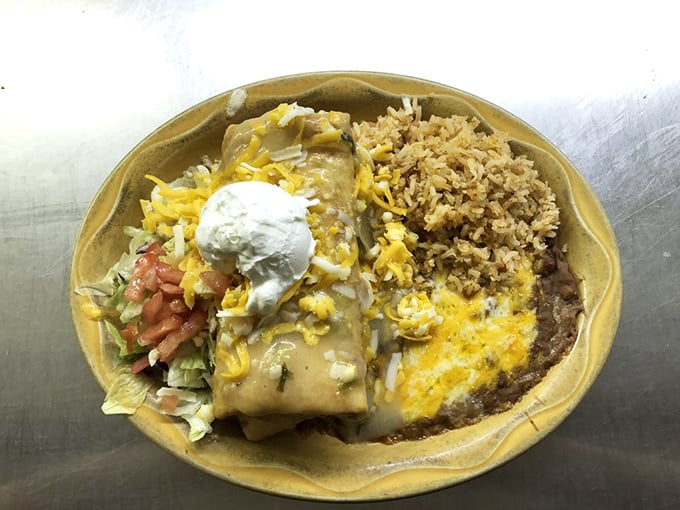 This chimichanga has achieved the impossible: crispy exterior, tender interior, and enough cheese to make Wisconsin nervous, all on one plate.