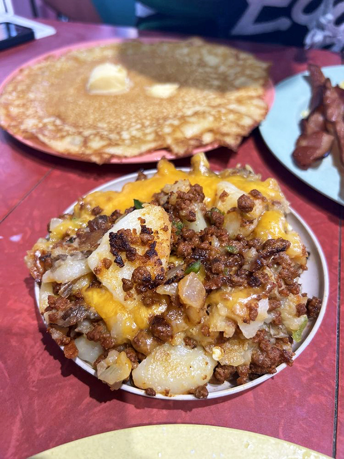 The chorizo hash doesn't just sit on the plate&mdash;it commands attention with melted cheese crowning a throne of spicy sausage and potatoes.