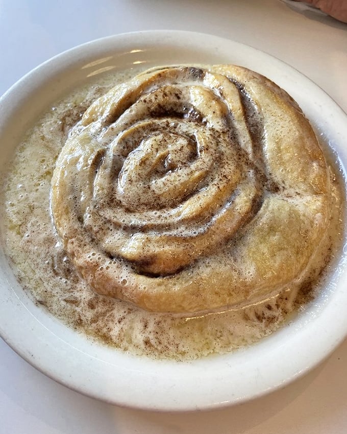 Not just a cinnamon roll, but a spiral of happiness swimming in its own buttery, cinnamon-spiced hot tub. Resistance is futile.