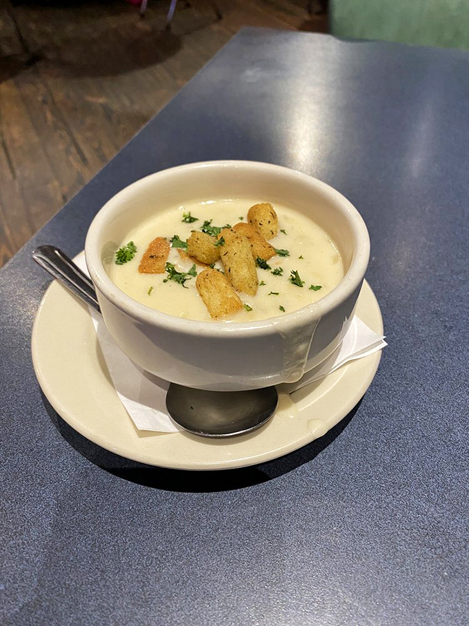 A bowl of creamy clam chowder that could make a New Englander nod in approval. Comfort in a bowl, topped with perfect croutons.
