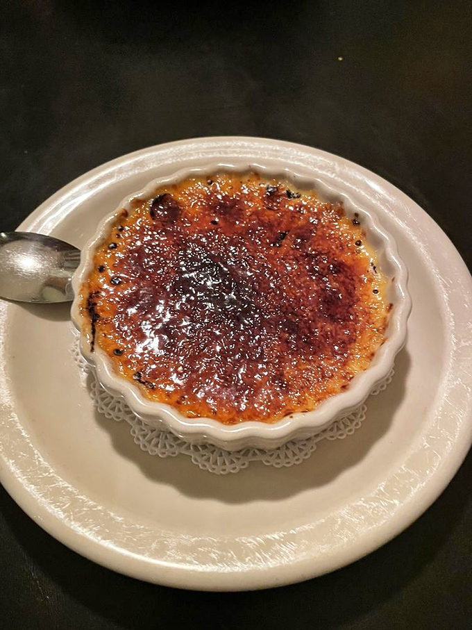 Cr&egrave;me br&ucirc;l&eacute;e with that perfect glass-like sugar crust &ndash; the sound of your spoon cracking through is half the pleasure.