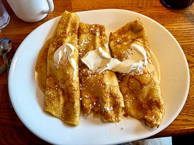 These delicate crepes with their dollops of whipped cream prove that pancakes aren't the only flat food worthy of breakfast devotion.