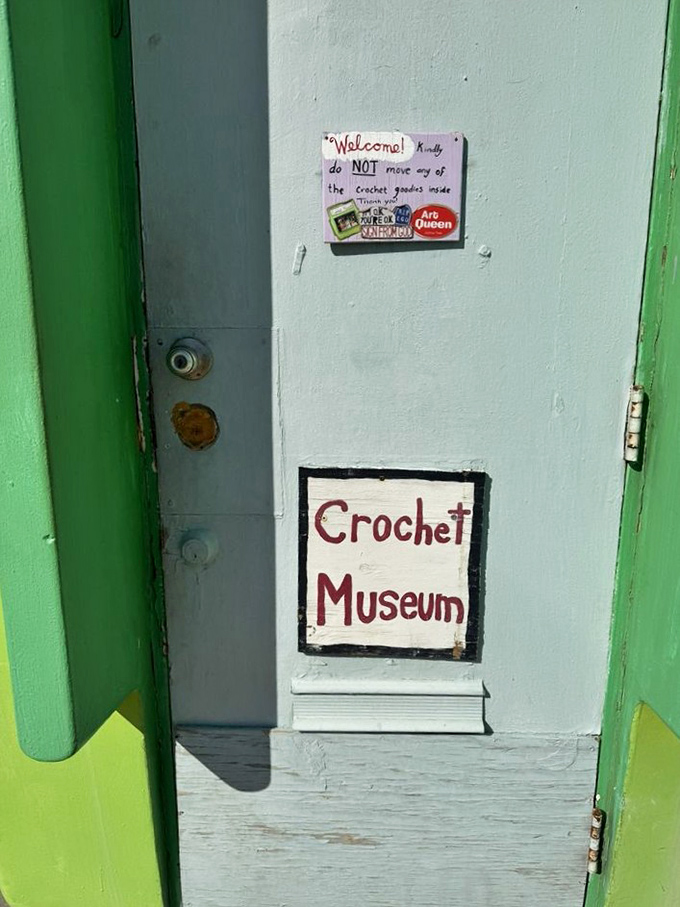 The simple "Crochet Museum" sign on the door understates what awaits: a mind-bending yarn-based treasure trove.
