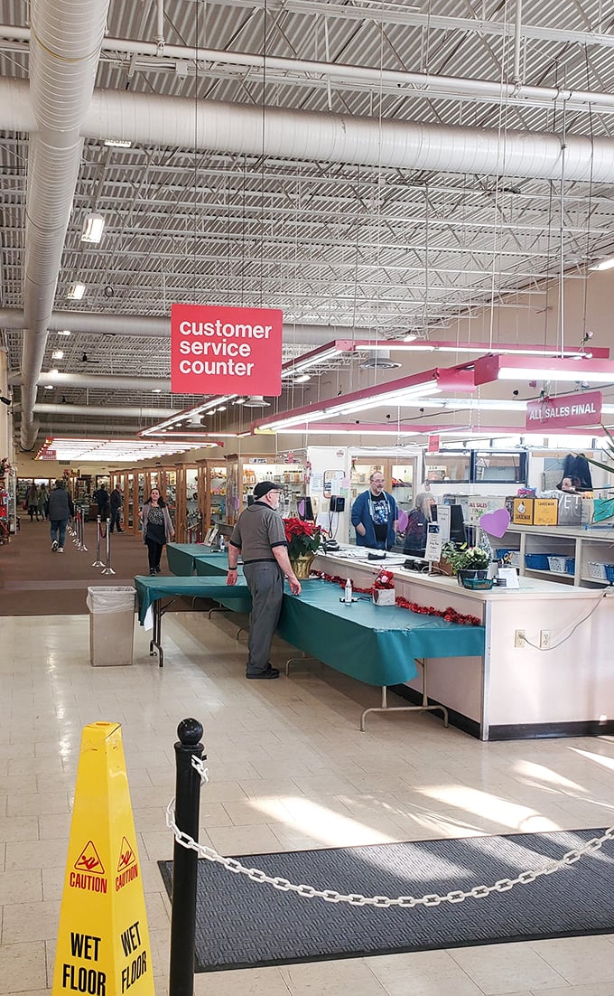 The customer service counter: where treasures are tallied, stories are shared, and credit cards silently weep.