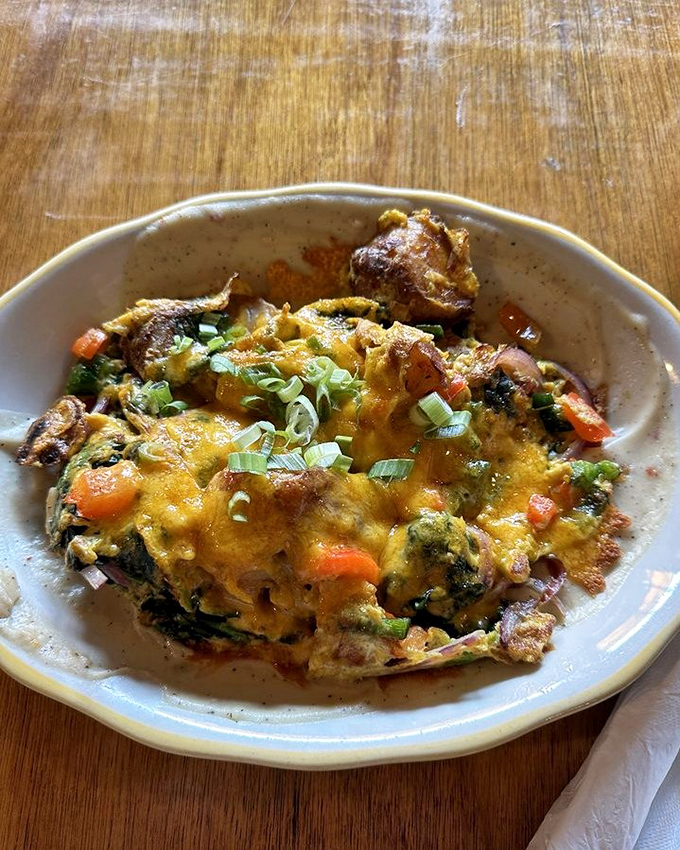 Dad's Hobo Hash isn't just breakfast&mdash;it's a colorful skillet expedition where eggs, vegetables, and cheese create a morning masterpiece worth exploring.
