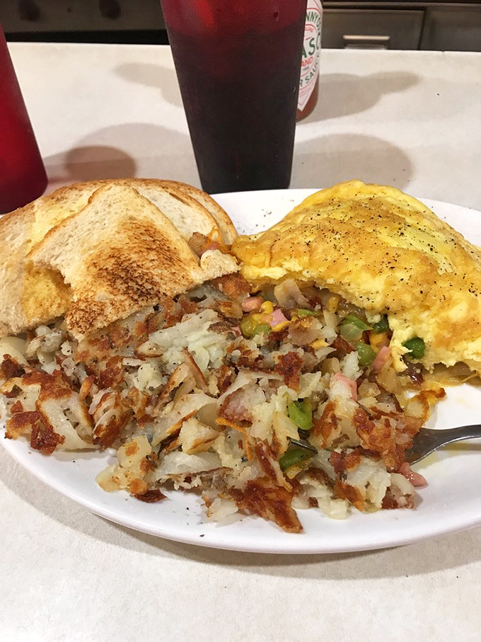 This Denver omelet and hashbrowns combo isn't just breakfast&mdash;it's edible therapy for whatever ails you on a Minnesota morning.